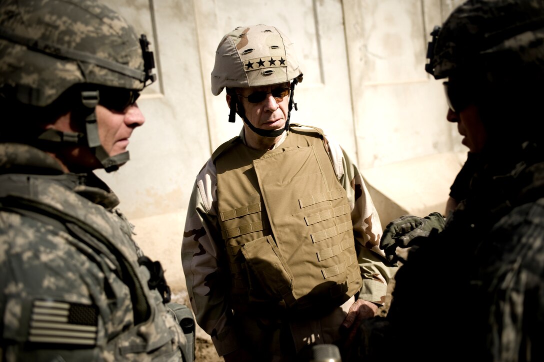 U.S. Army Col. Ricky Gibbs and Maj. Gen. Jeffery Hammond, left, brief U ...