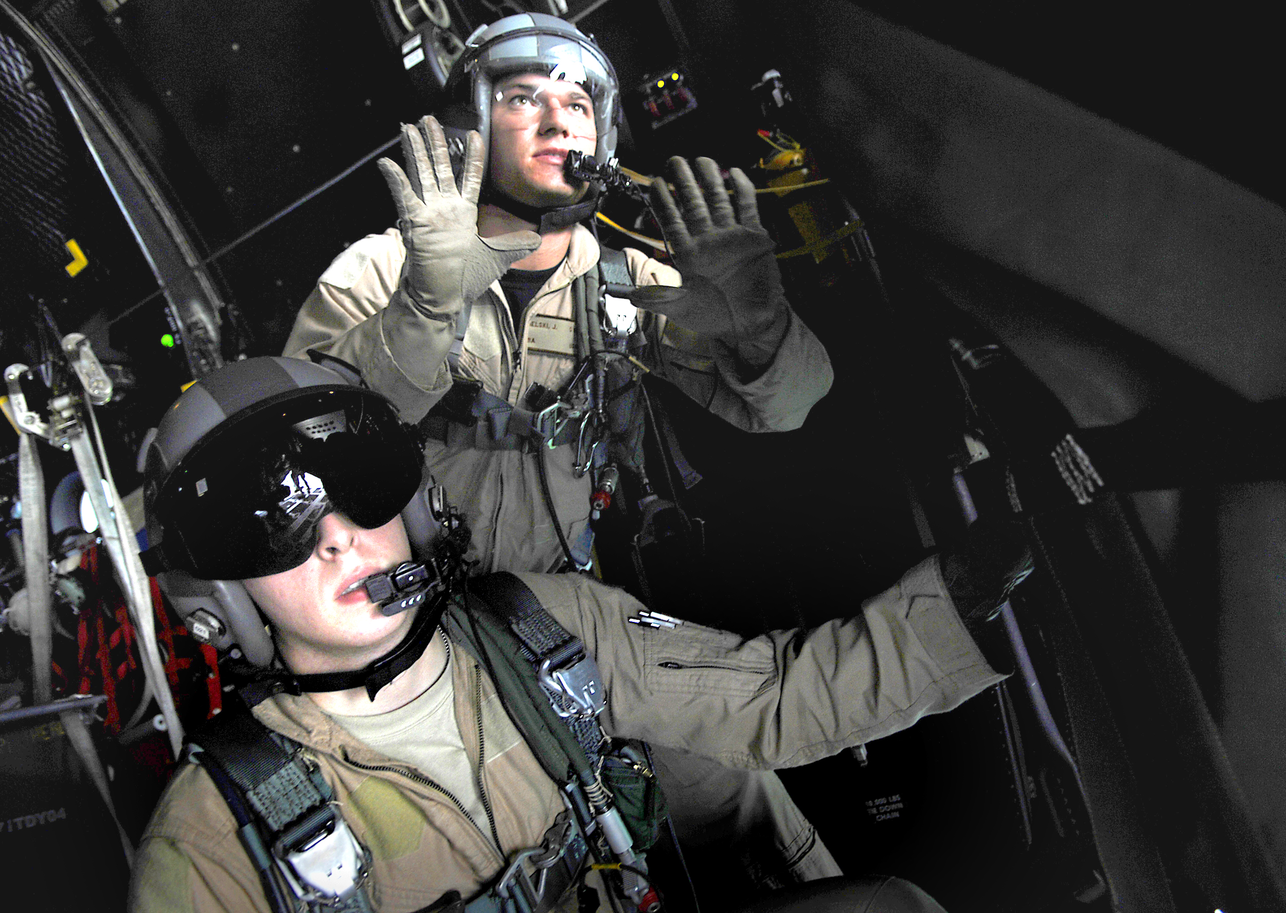 U.S. Air Force Senior Airmen Geoffery Koppel and Justin Gielski prepare ...