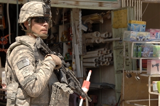 Pvt. 2nd Class David Morrison provides security. | U.S. Department of War