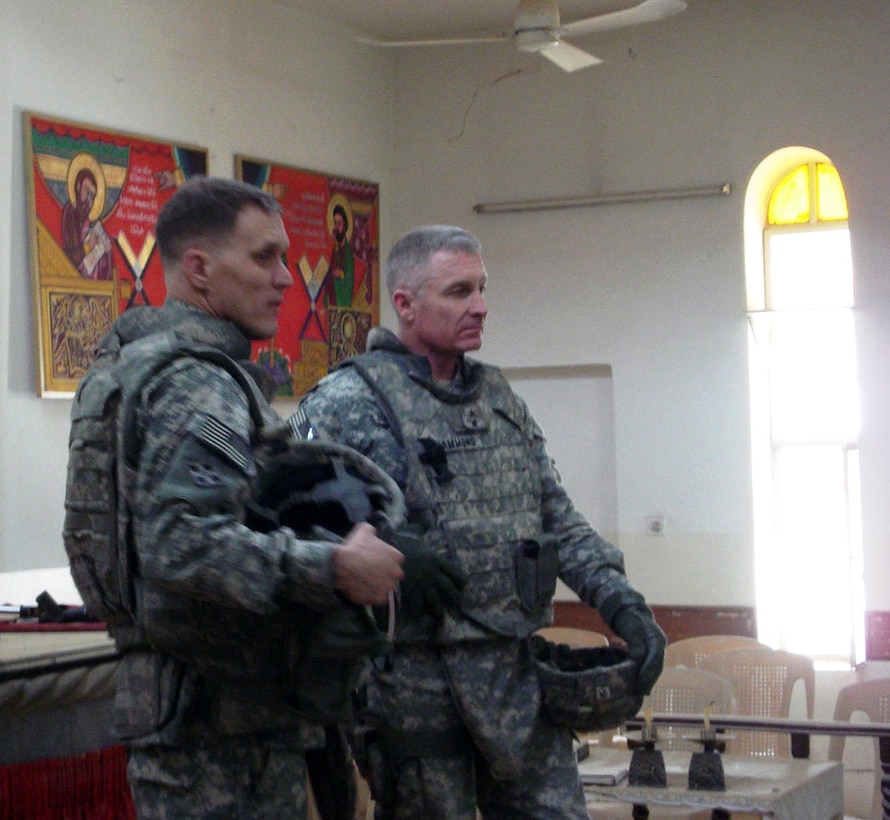 Army Lt. Col. Troy Smith (left) speaks with Army Maj. Gen. Jeffery W ...
