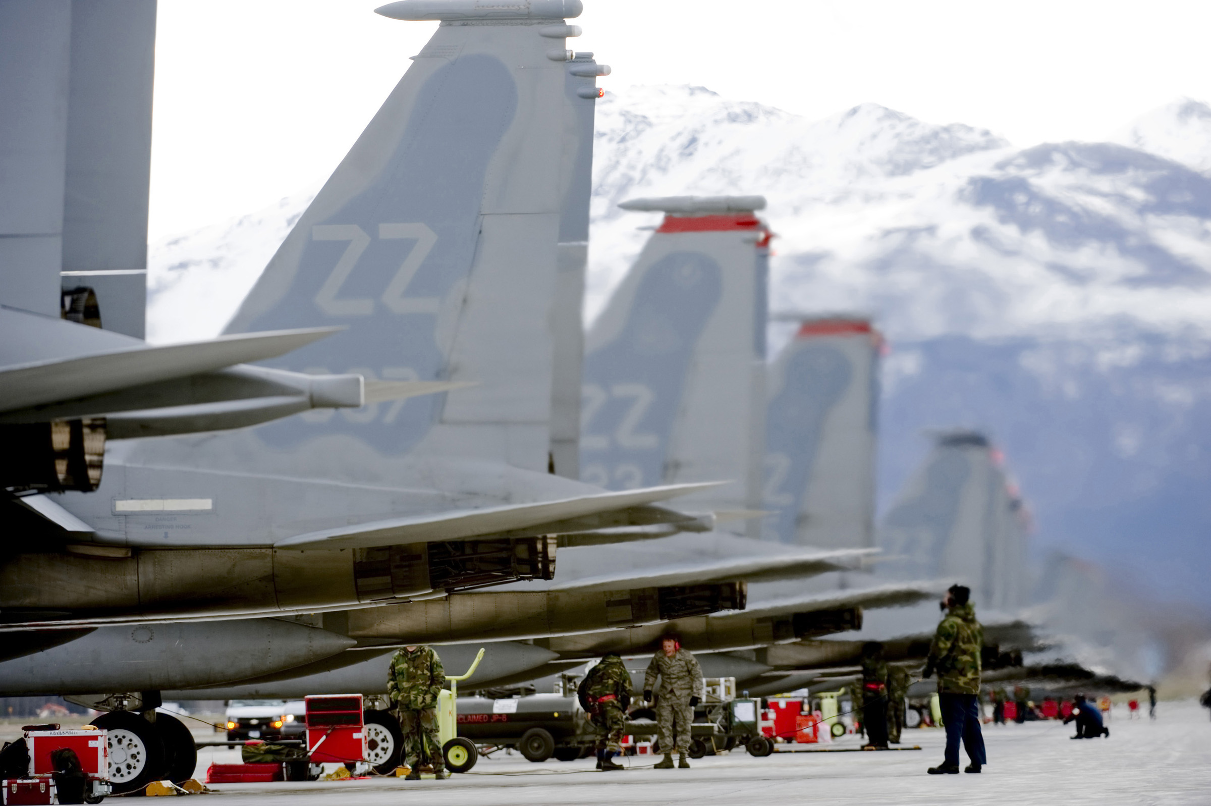 Conducting pre flight checklist on a F-15 Eagle