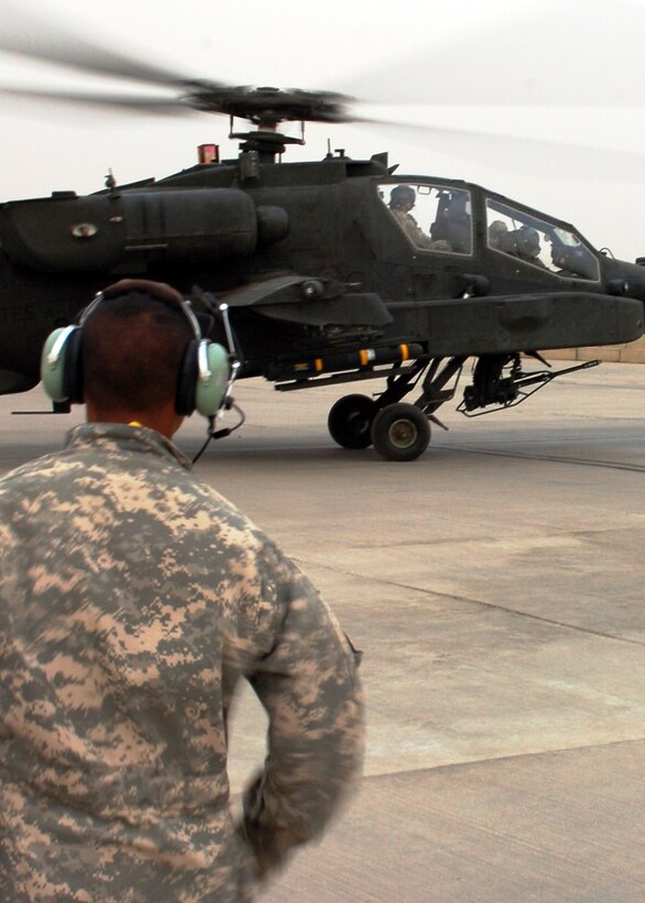 Army Cpl. Jimmy Duenas, a Guam native who serves as an Apache mechanic ...