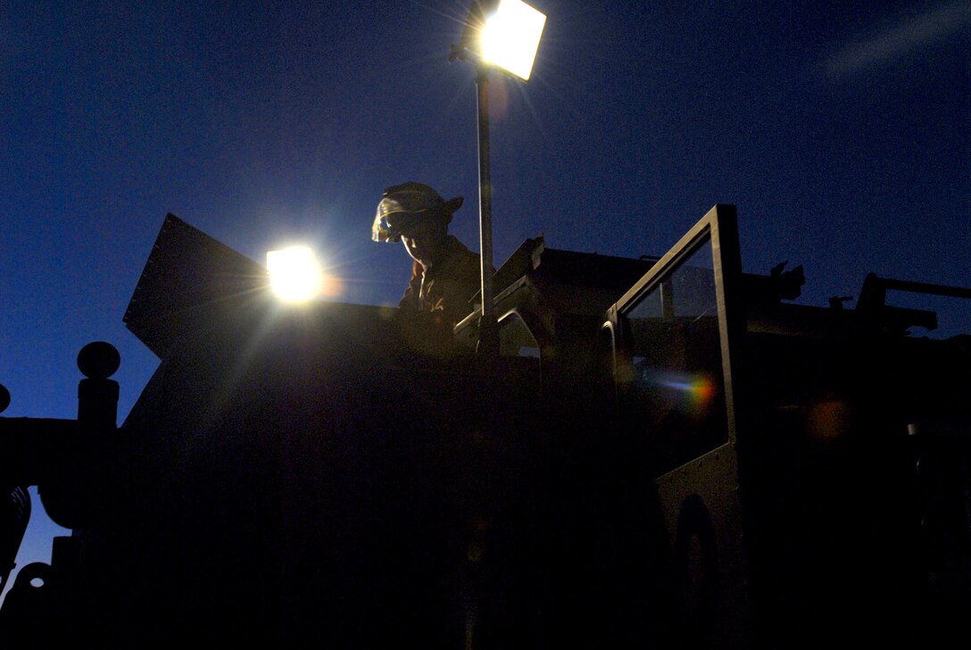 A soldier assigned to the 20th Engineer Brigade's 513th Fire Fighting ...