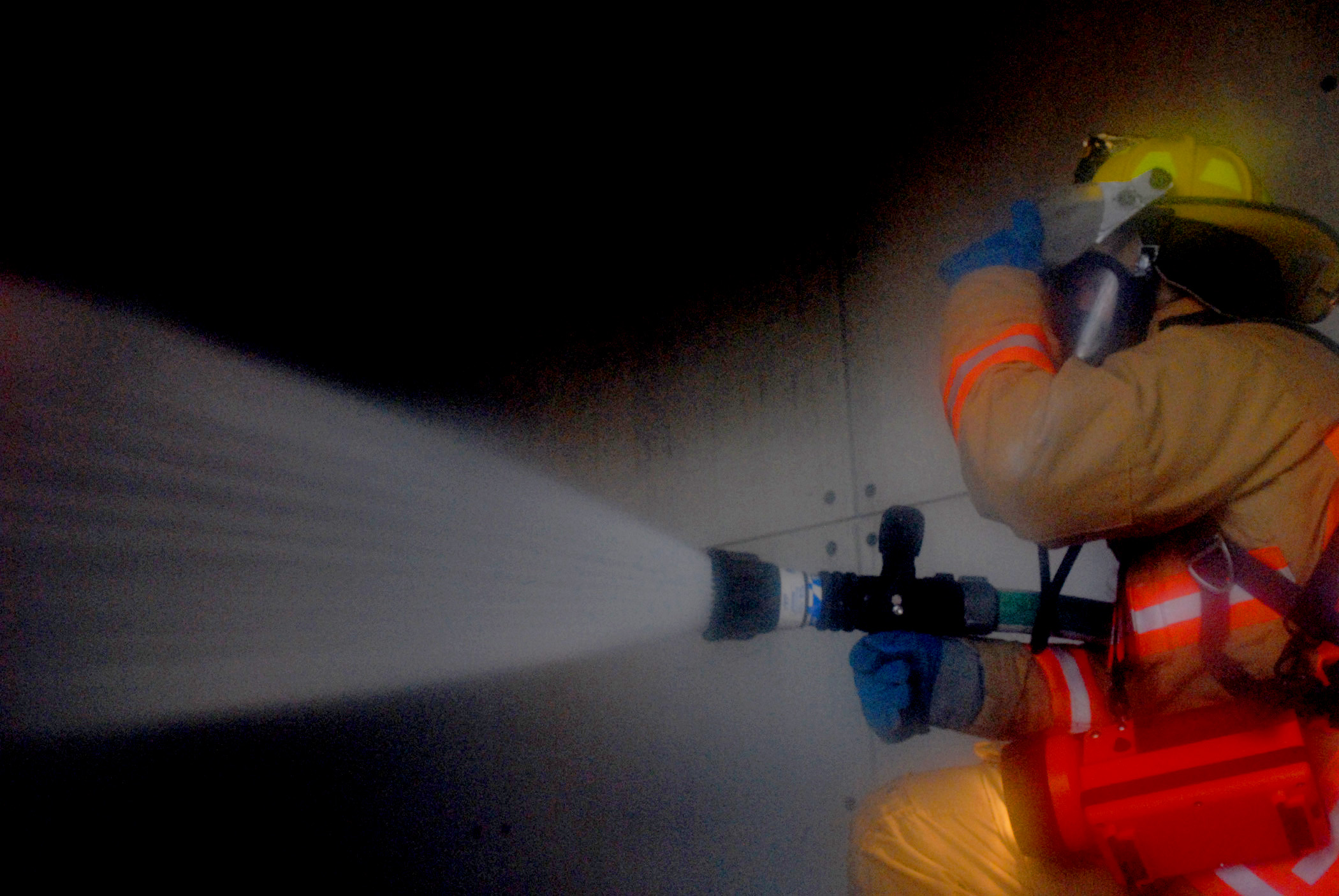 U.S. Army Spc. Ronald Janik, assigned to the 513th Fire Fighting ...