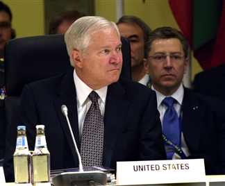 Secretary Gates listens to opening remarks. | U.S. Department of War