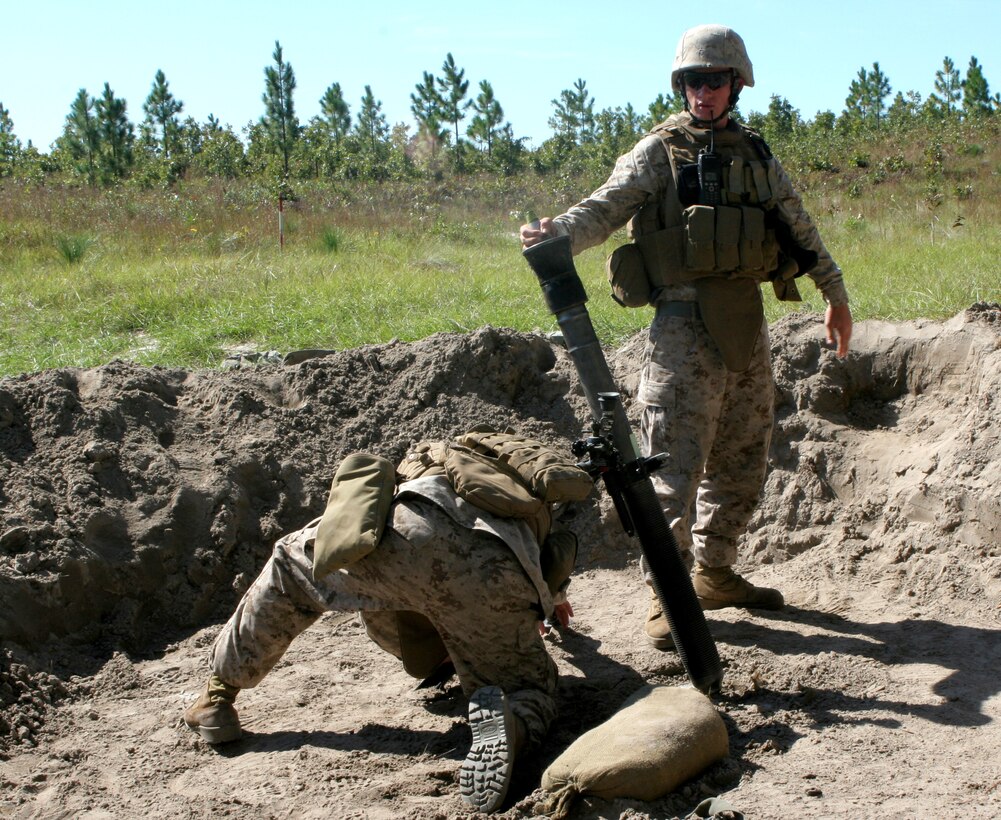 U.S. Marines fire red phosphorous and high-explosive 81mm mortars, Oct ...