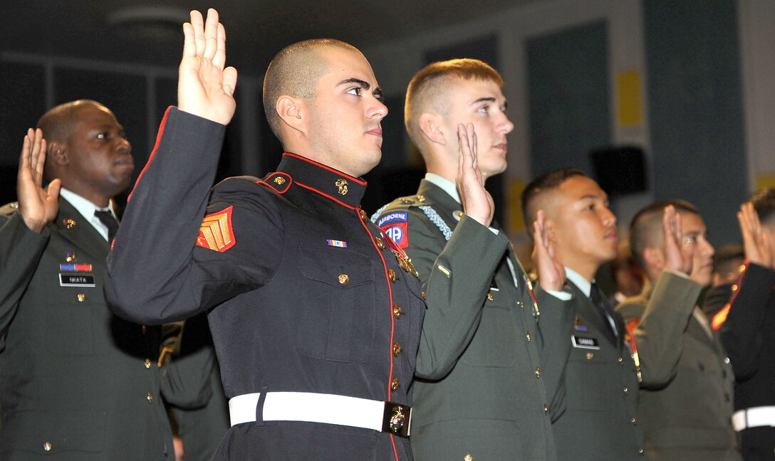 Members of the U.S. military take the oath of citizenship on Pope Air ...