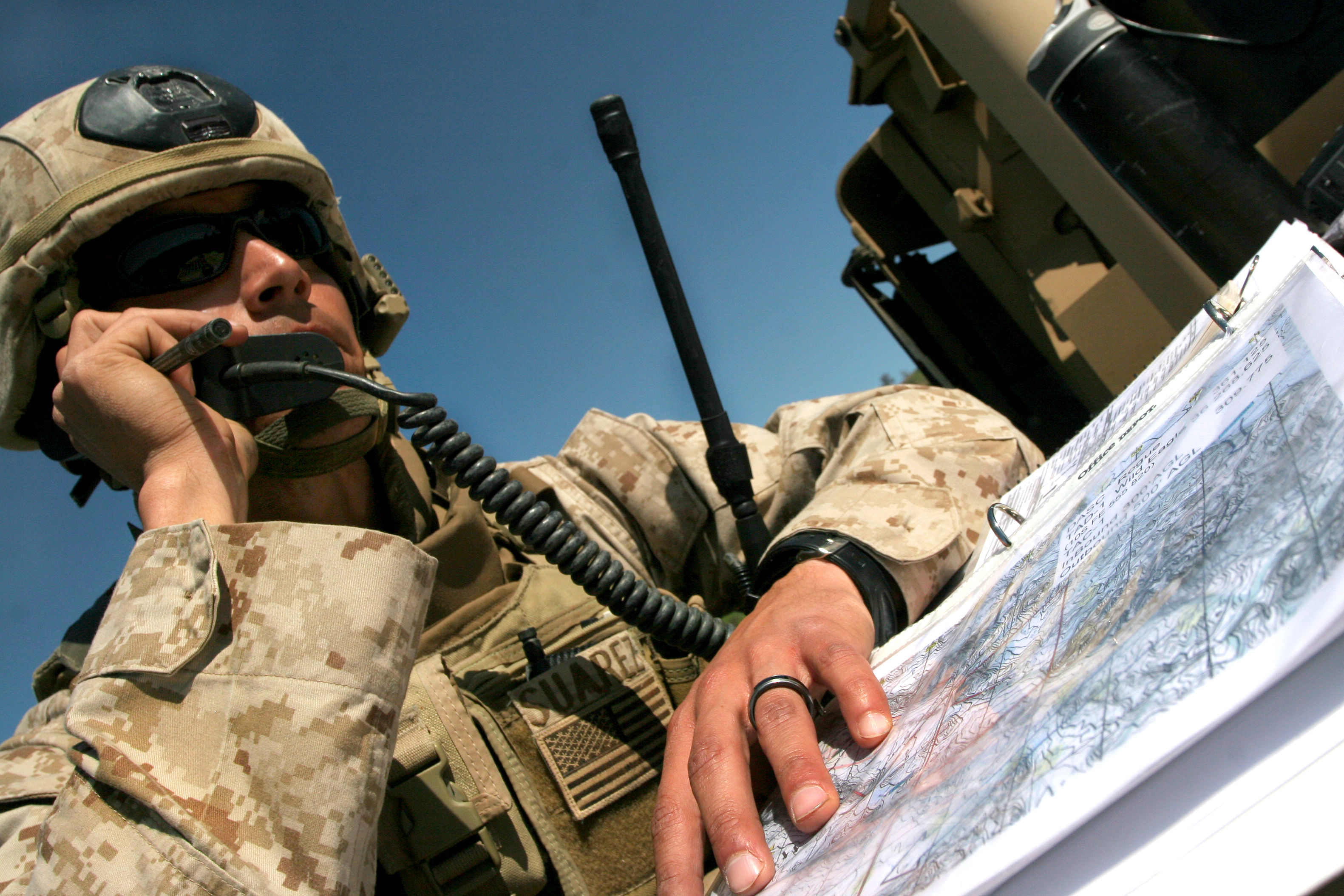 U.S. Marine Capt. Robert Suarez establishes communication with range ...