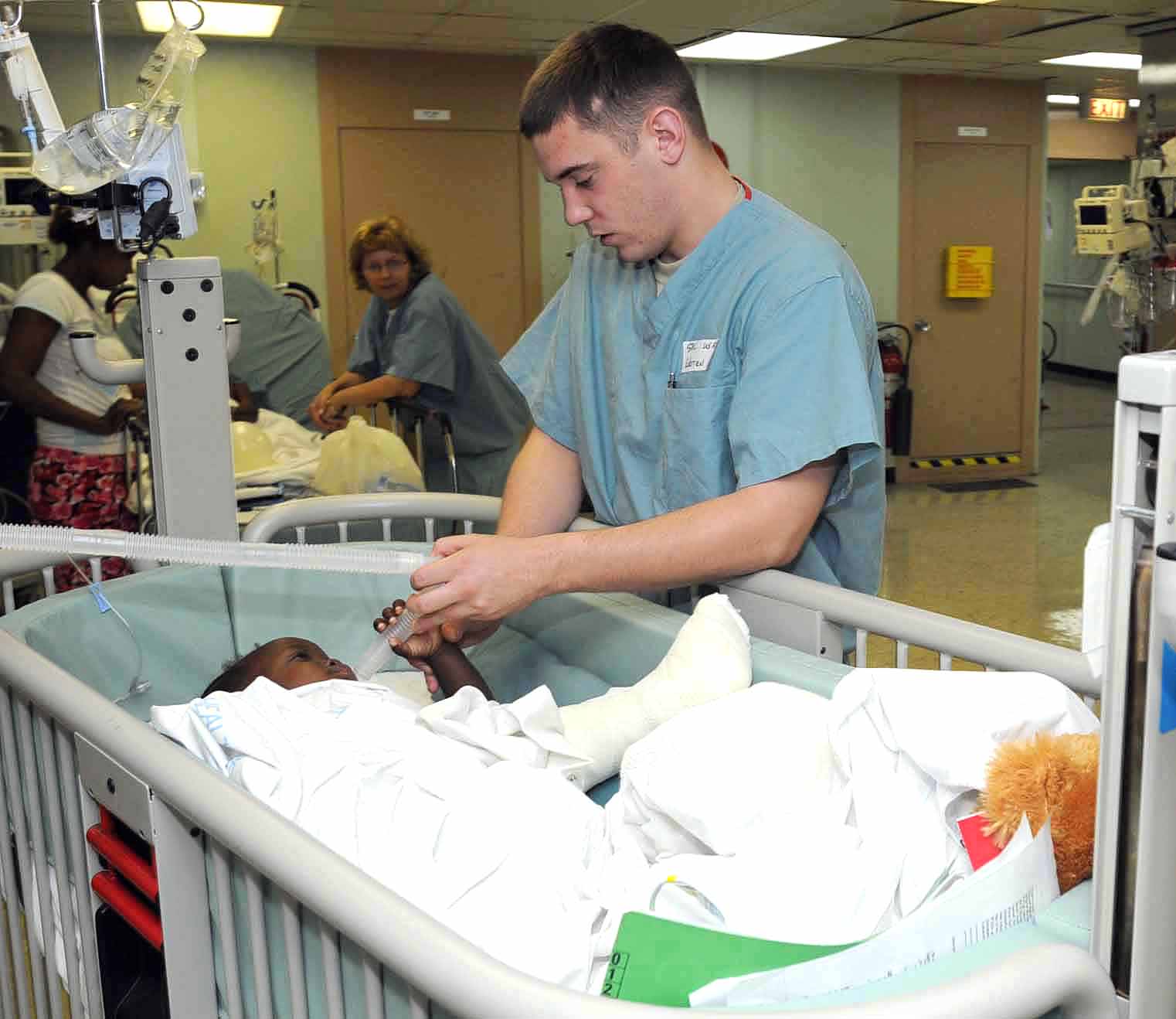 U.S. Navy Spc. Timothy Warren, assigned to the 807th Medical Command ...