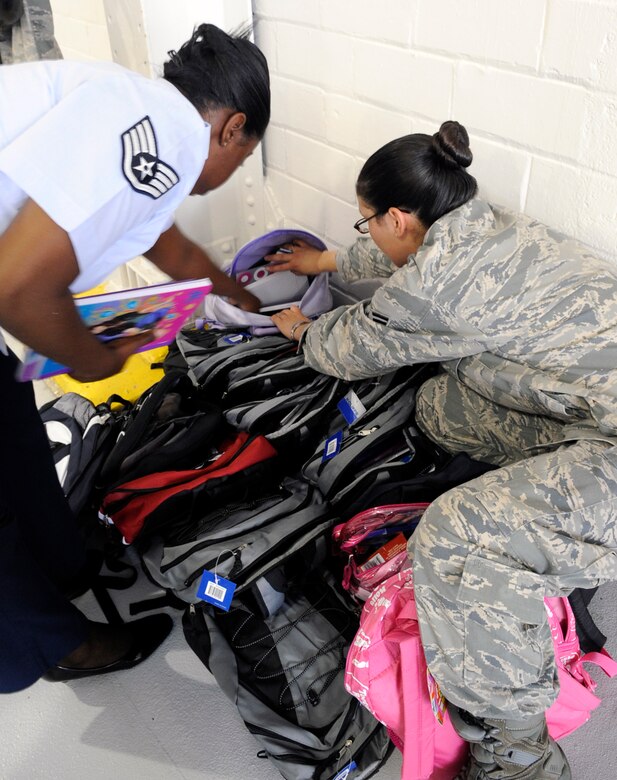 Armed Backpack Brigade rescues financially burdened parents > Joint ...