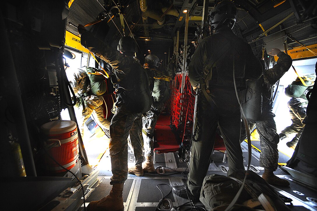U.S. Army Rangers jump from an MC-130 Combat Talon II from the 15th ...