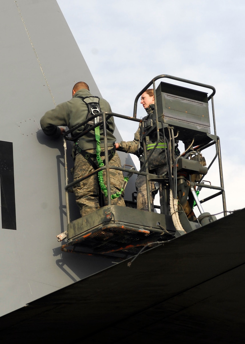 Inspecting a C-130 > U.S. Air Forces Central > Display