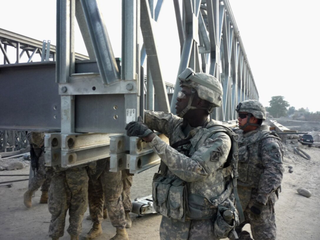 International Security Assistance Force servicemembers assemble the new ...