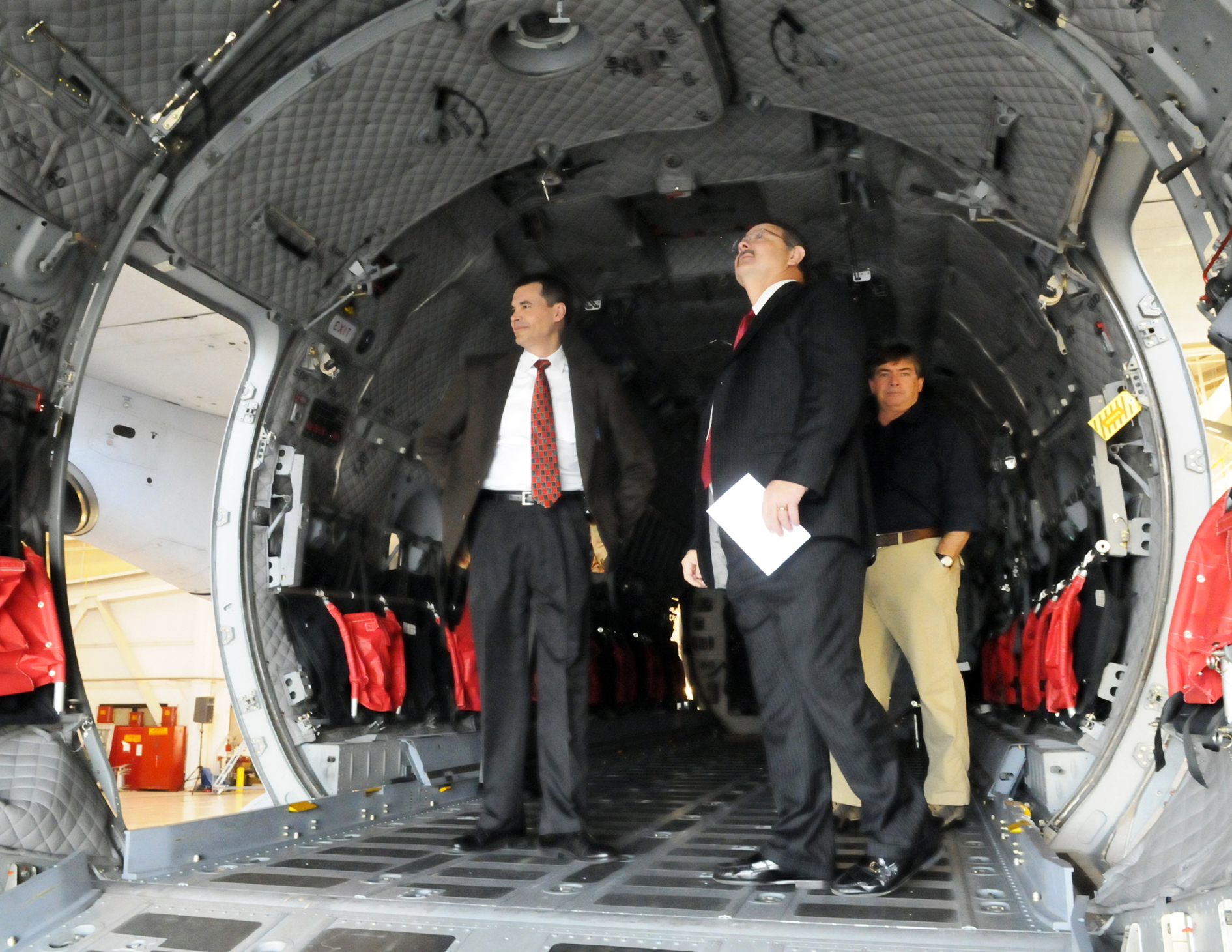 Carl Unholz, Deryl Israel and Mike Lavengood walk through the inside of ...