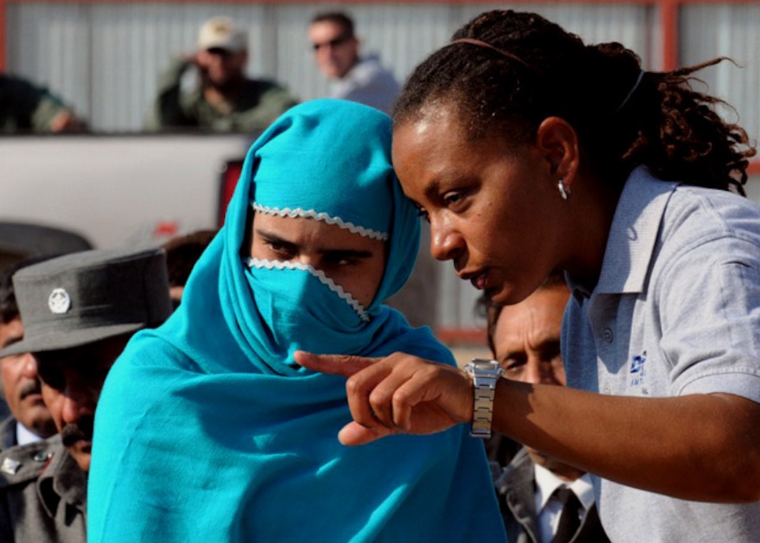 Tonya Joseph, right, one of two mentor trainers with the International ...