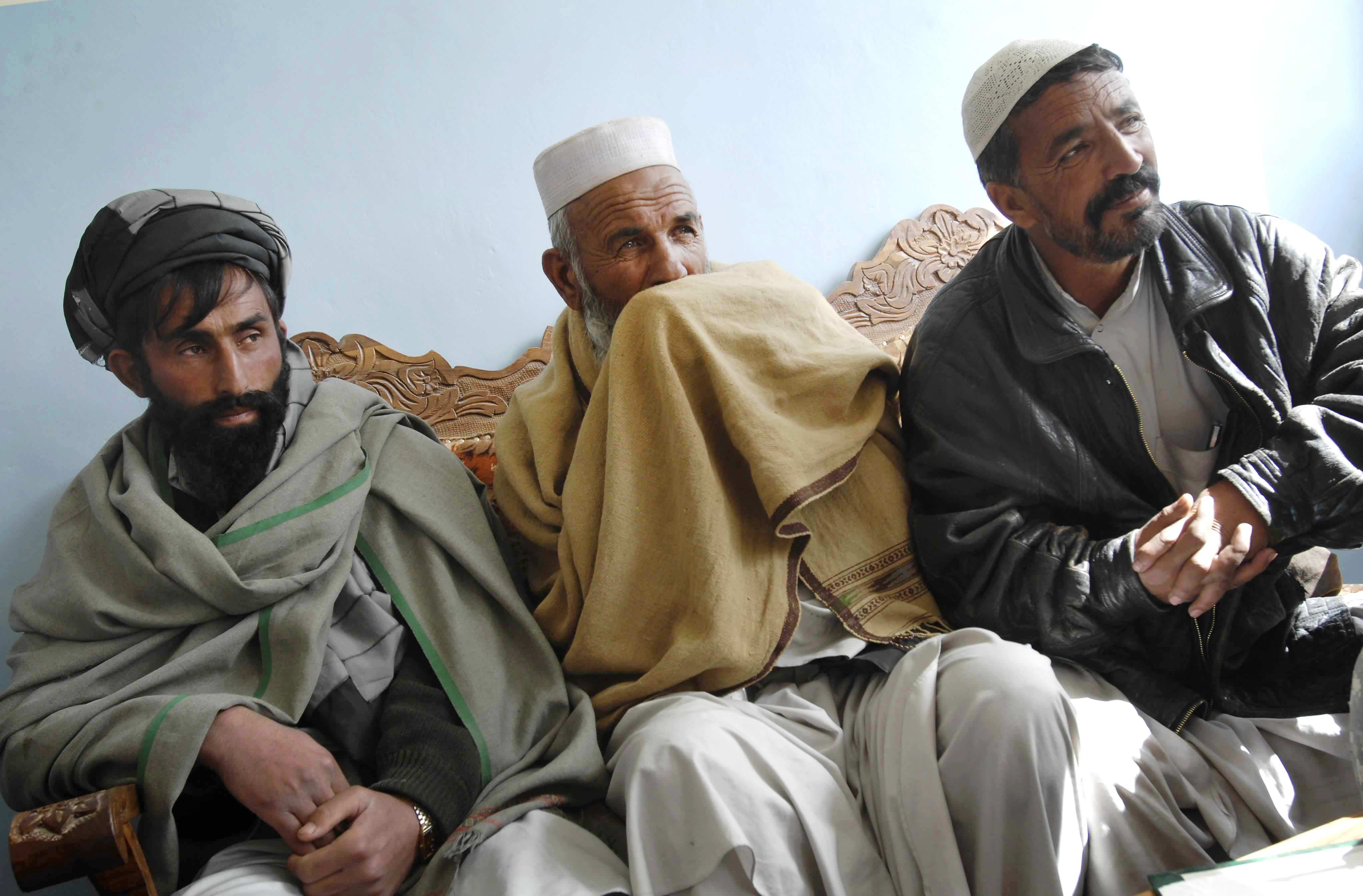 Afghan tribal elders listen during a meeting with Paktia Provincial ...