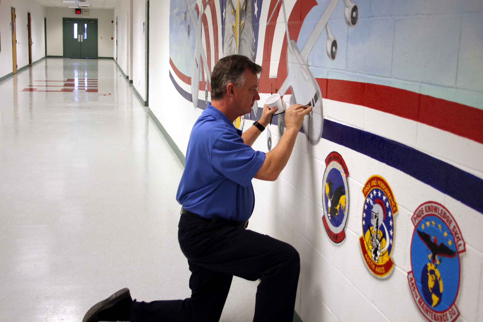 Mural brightens up 445th Maintenance Group building > 445th Airlift Wing > Article Display