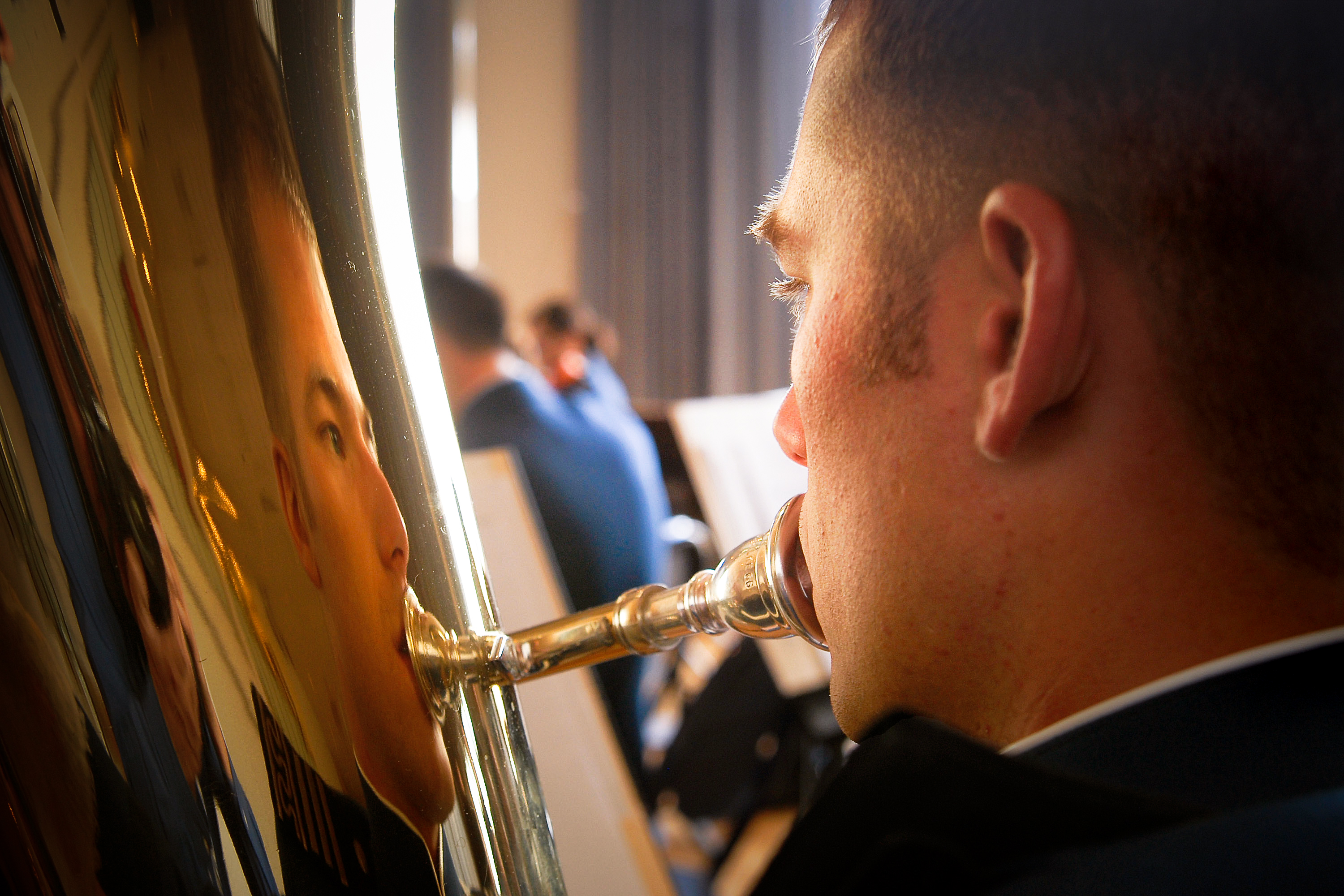 Tuba saluting the sponsors