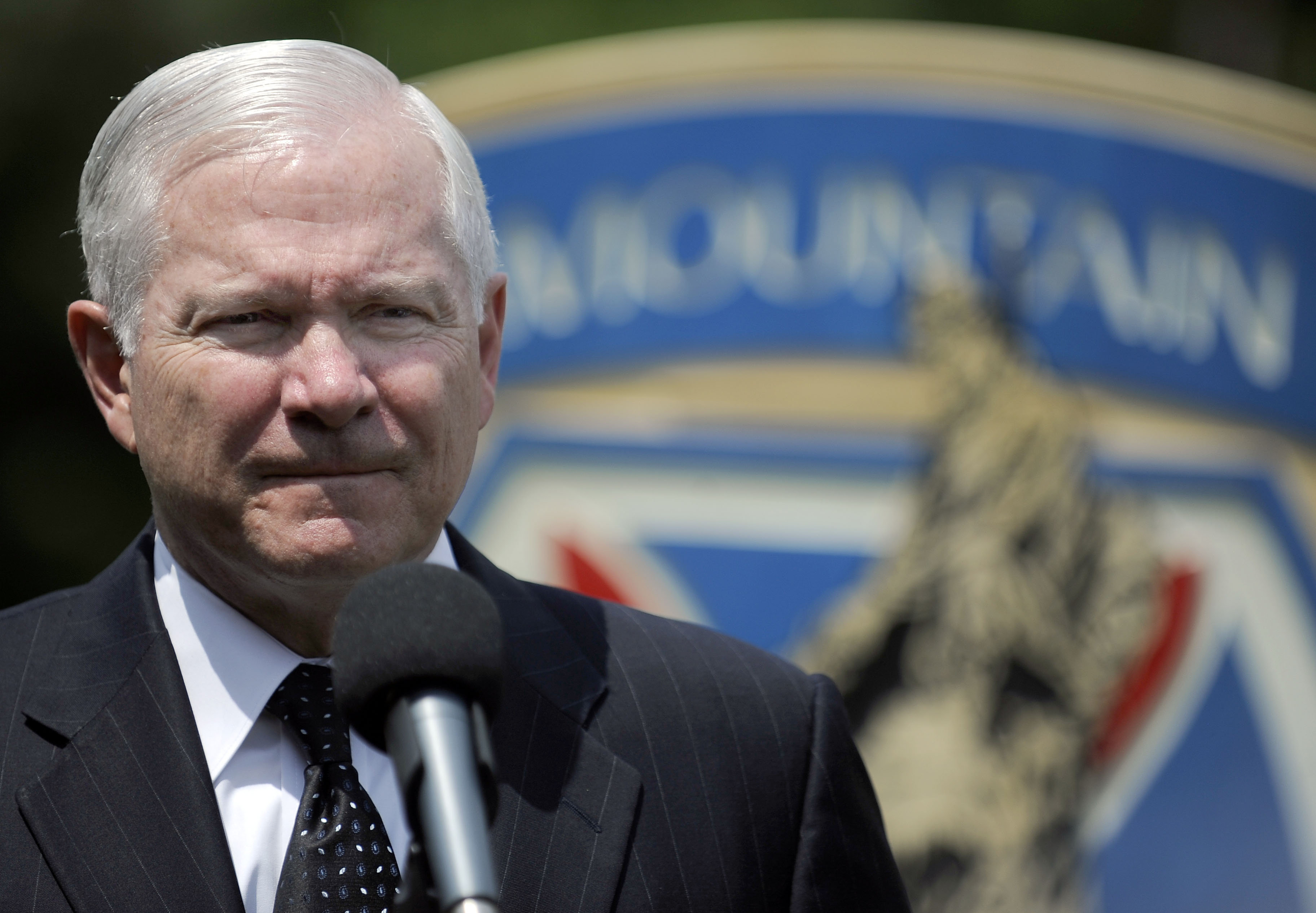 Defense Secretary Robert M. Gates talks with members of the press after ...