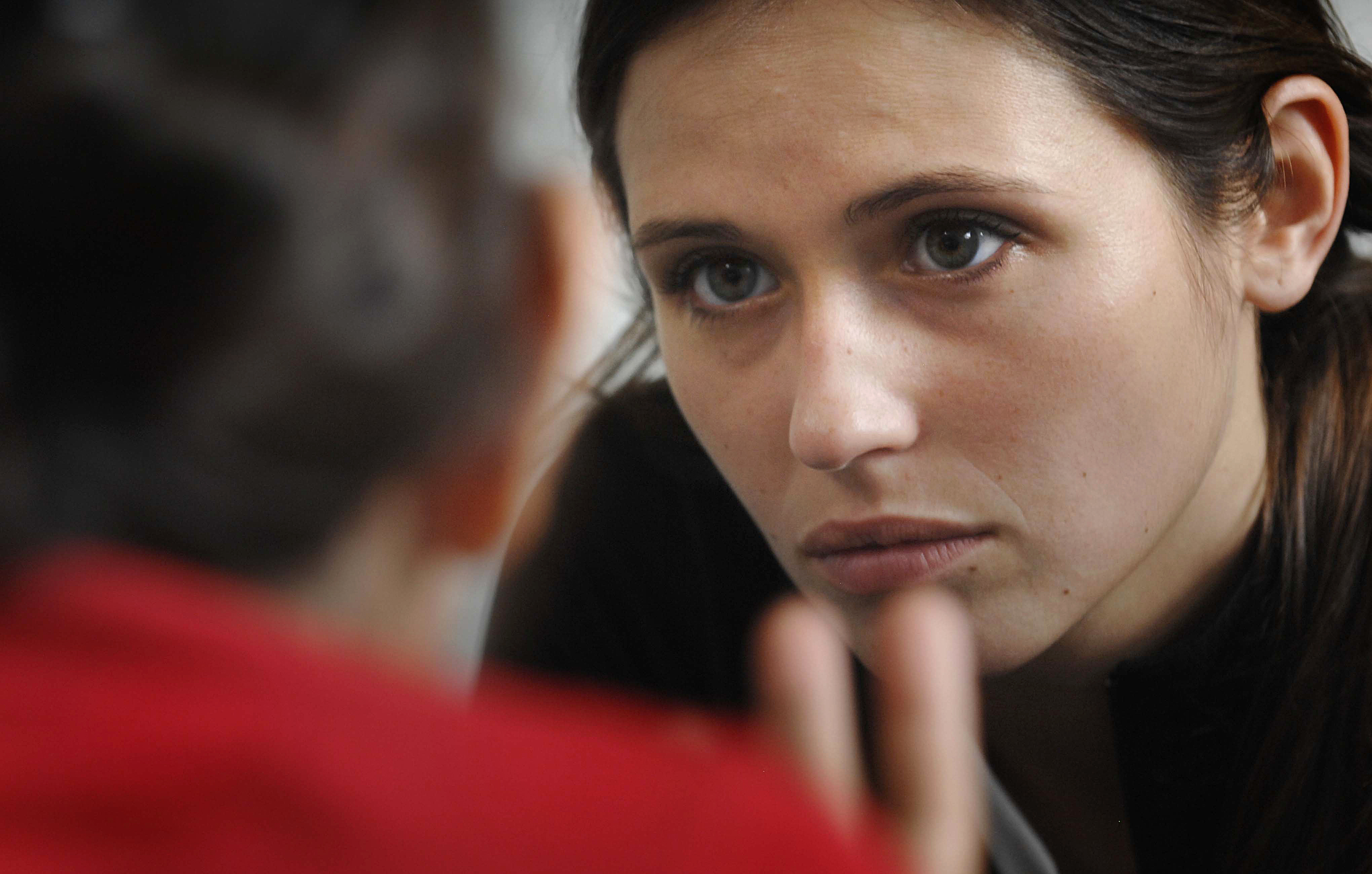 U.S. Southern Command intern Rachel Libby listens as a Nicaraguan woman describes the symptoms ...
