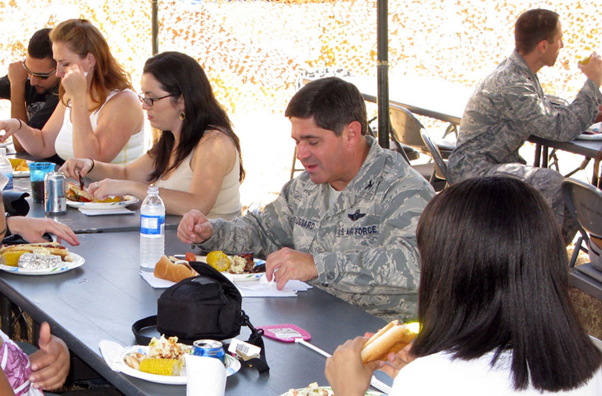 349th vice commander enjoys a meal with members, families of 349th Air ...
