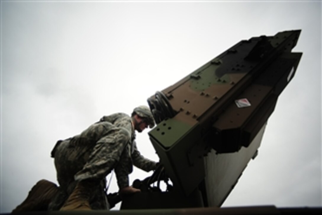 Spc. Nathan Williams deploys a Sentinel radar system. | U.S. Department ...