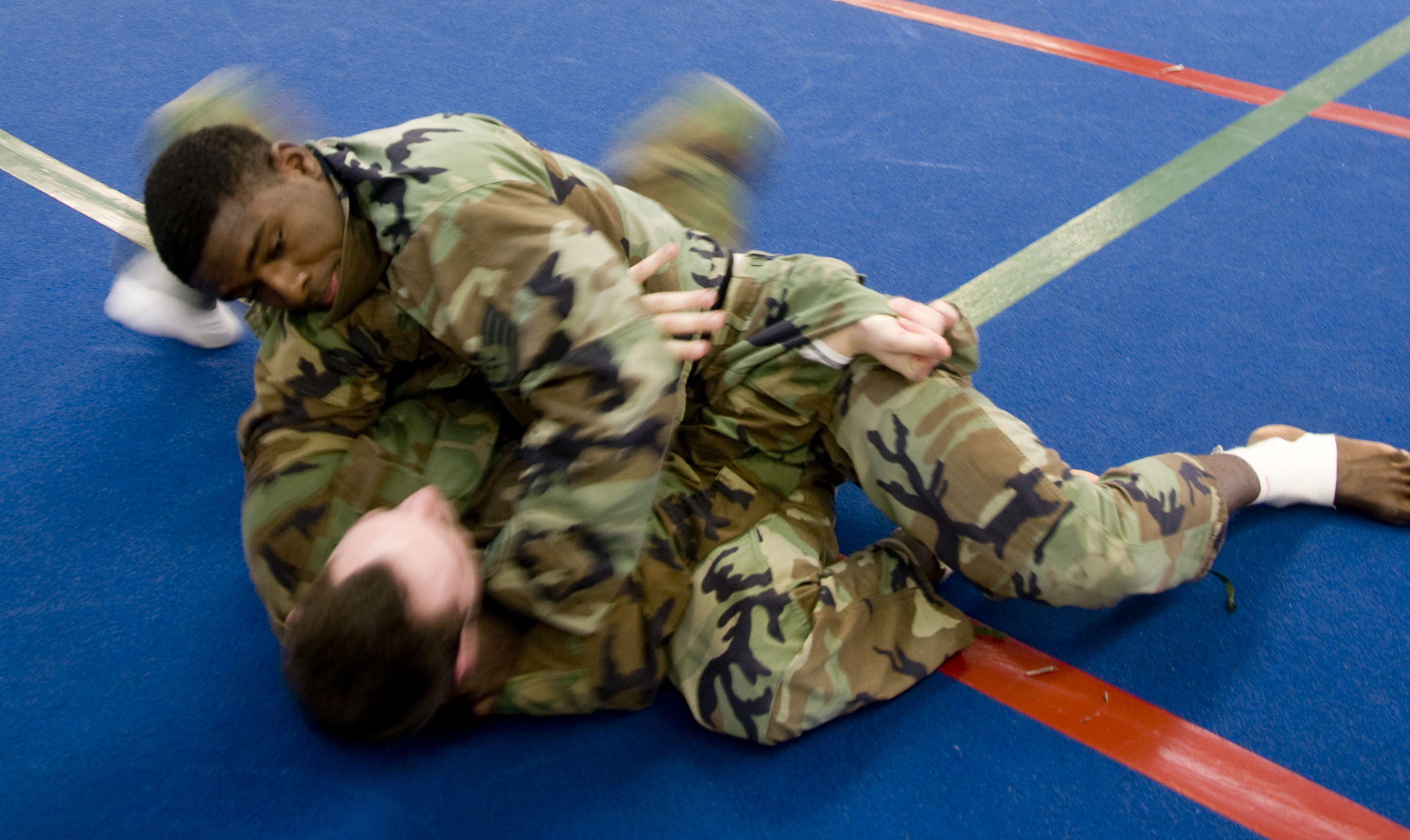 Army instructors fight hand-to-hand with residents