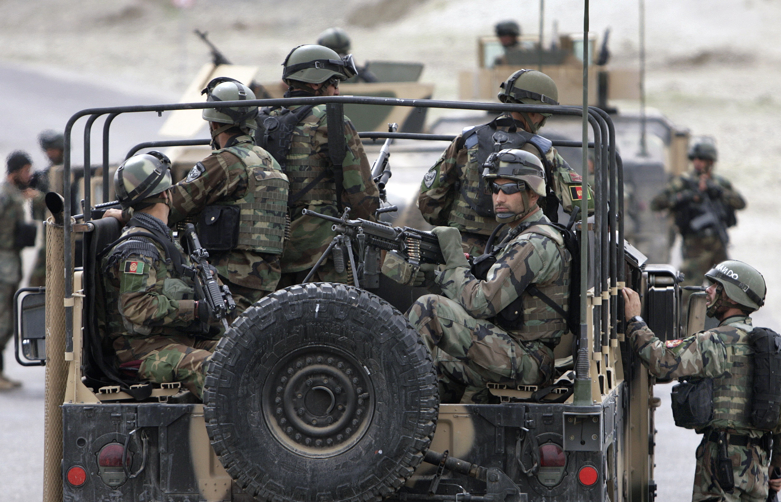 Afghan National Army Commandos prepare for a cave clearing operation in ...
