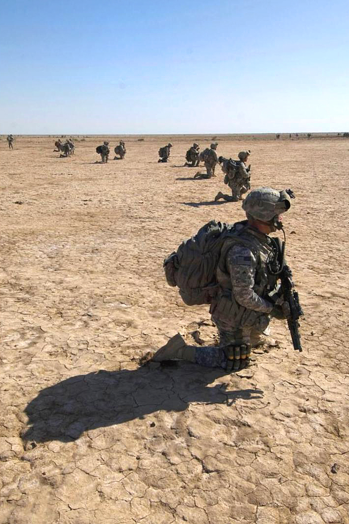 U.S. Army soldiers set a security perimeter while searching for and ...
