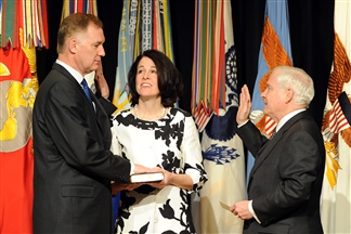 Secretary Gates administers the oath of office to Deputy Secretary of ...