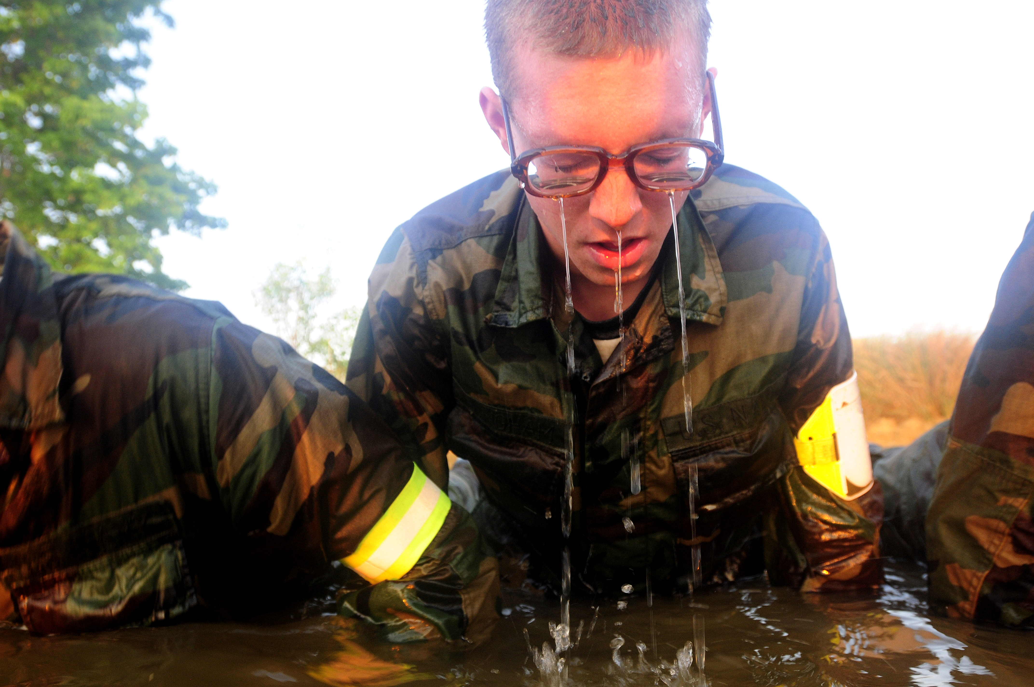 Navy Midshipman 4th Class James Brigham conducts physical training ...