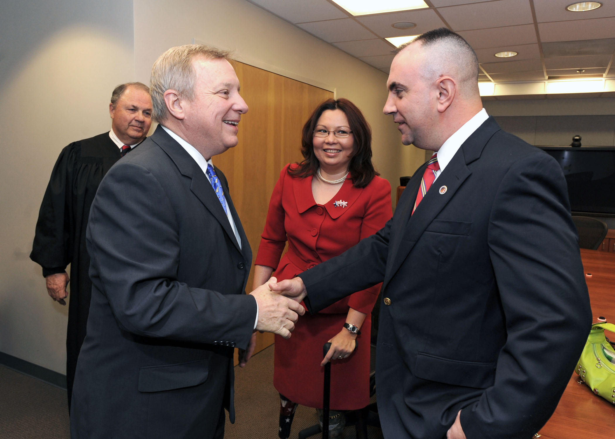 L. Tammy Duckworth, center, assistant secretary of veterans affairs for ...