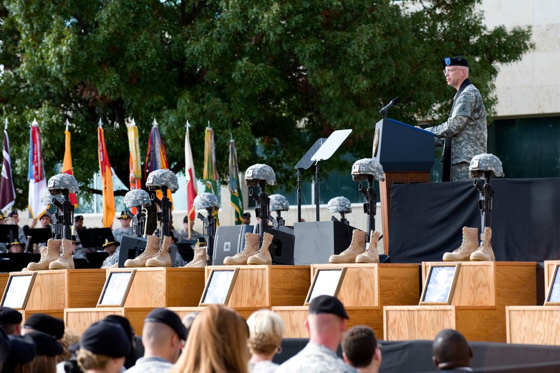 Chaplain of III Corps Col. Michael Lembke addresses the audience during ...