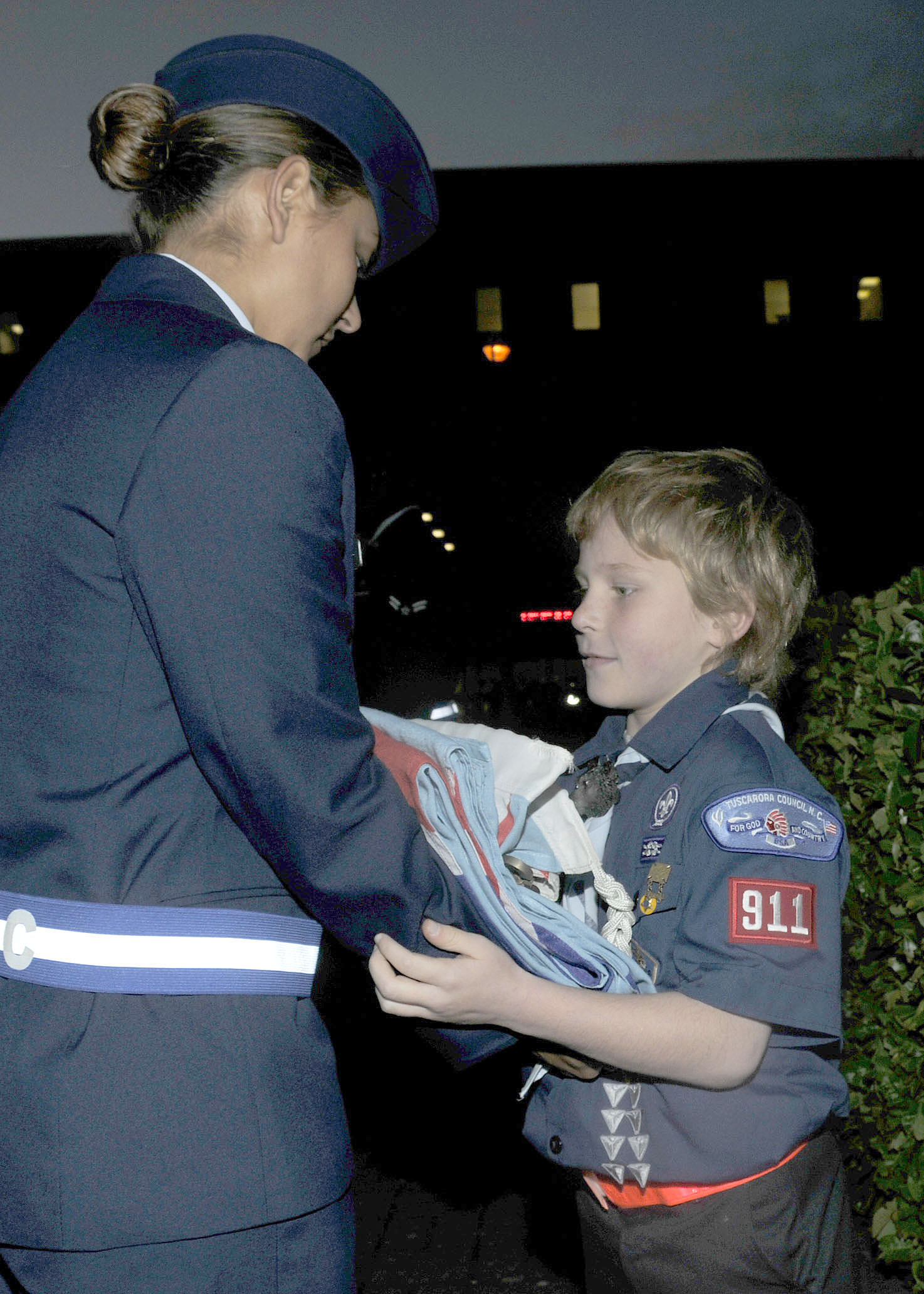 Cub Scouts help with retreat ceremony