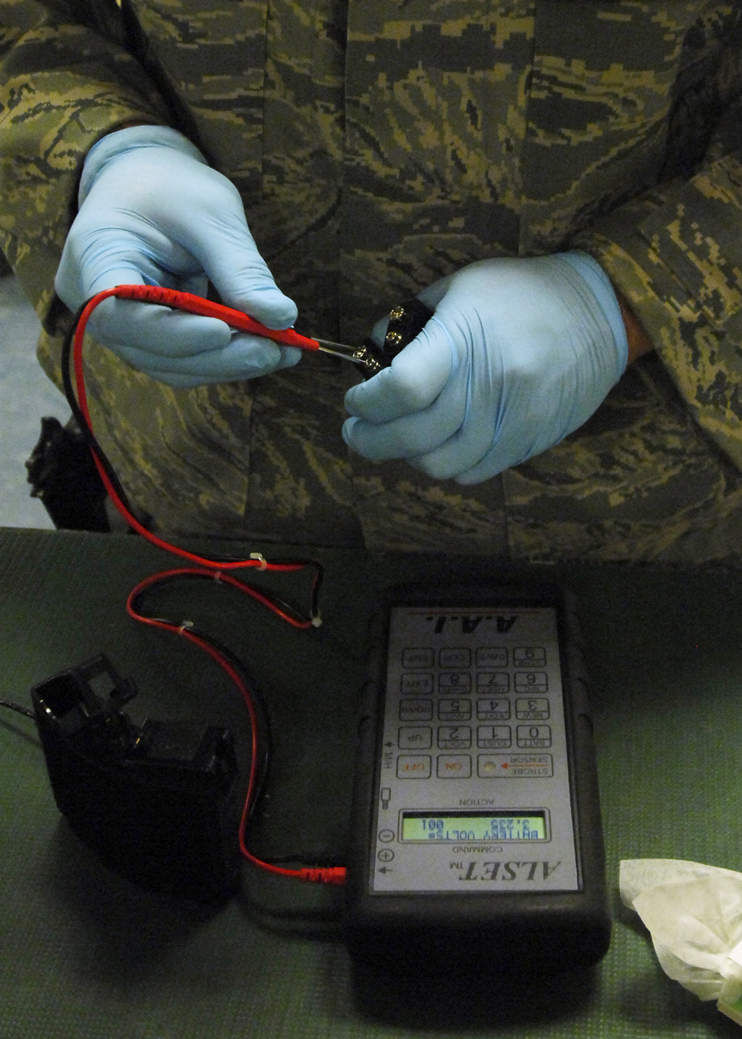 Airmen cleaning flight equipment > U.S. Air Forces Central > Display
