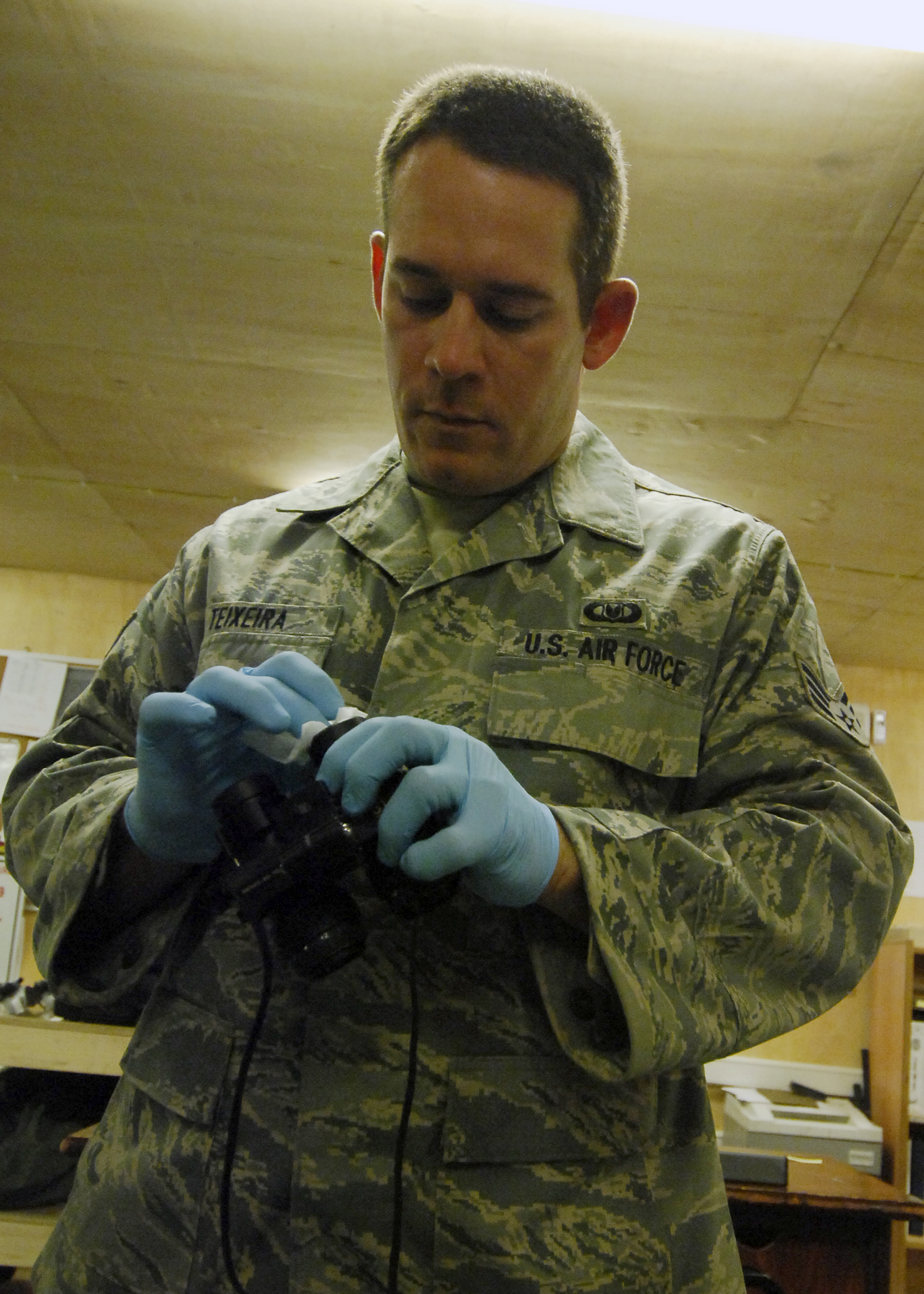 Airmen cleaning flight equipment > U.S. Air Forces Central > Display