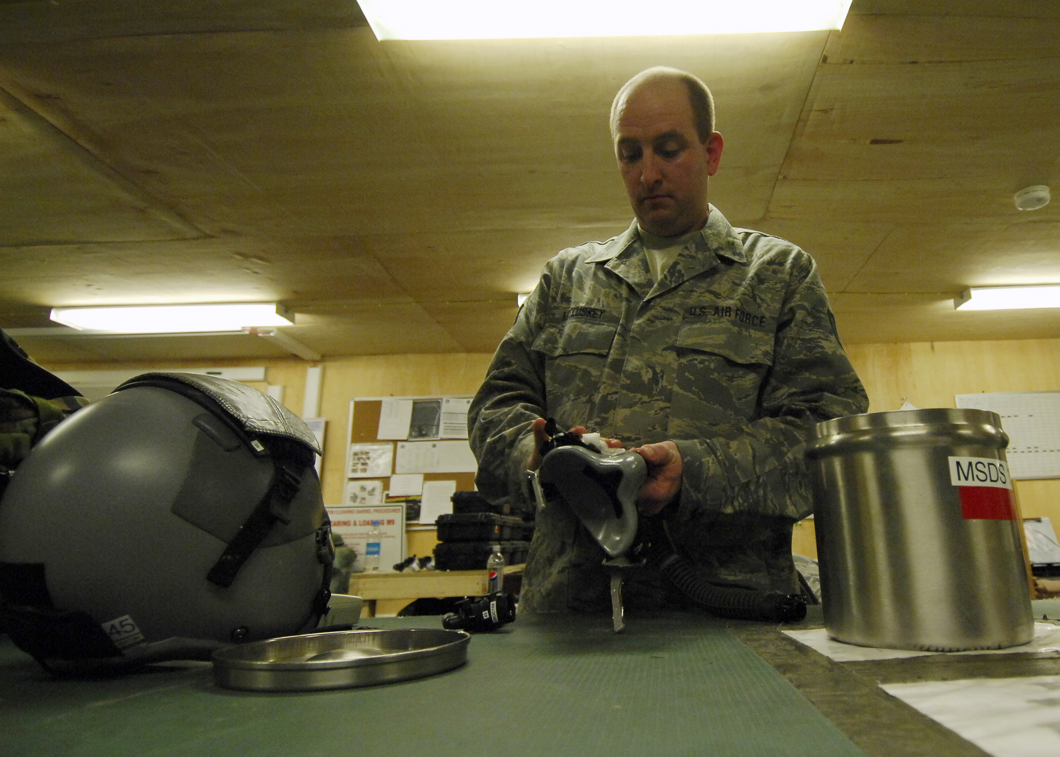 Airmen cleaning flight equipment > U.S. Air Forces Central > Display