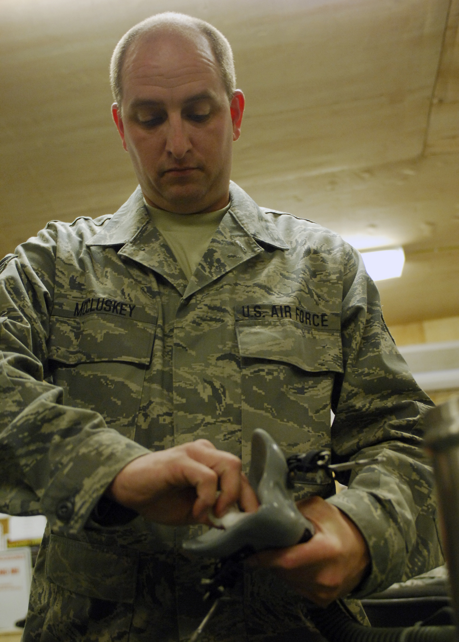Airmen cleaning flight equipment > U.S. Air Forces Central > Display