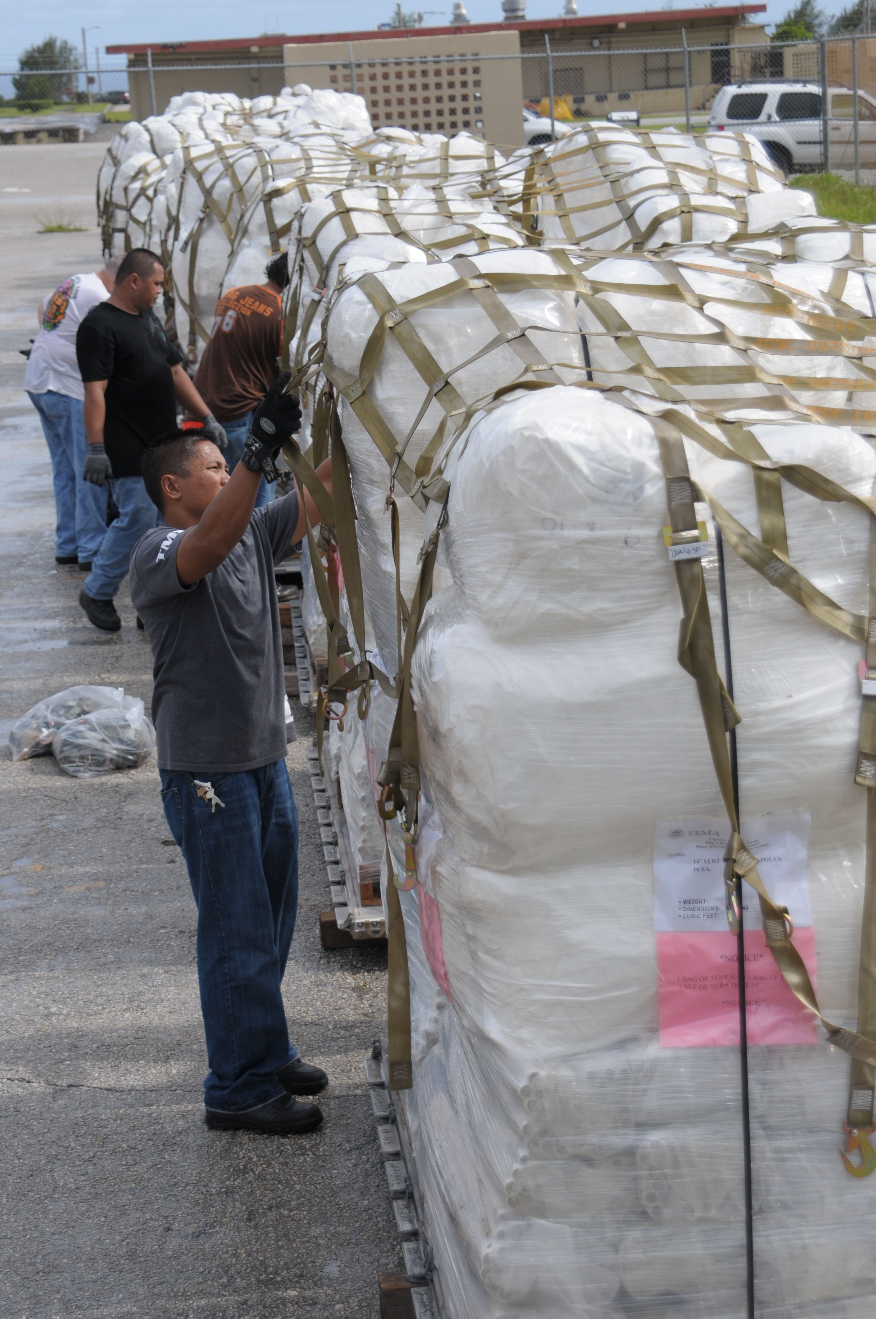 DZSP 21 contractors palletize FEMA tents > Andersen Air Force Base ...