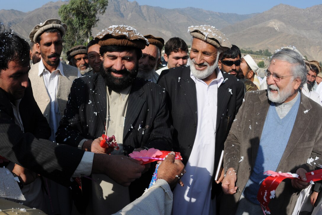 Left to right, Sarkani Subgovernor Hamish Gulab, Marawara Subgovernor ...