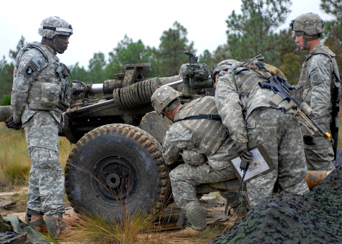 U.S. Army Master Sgt. Anthony Smith watches paratroopers perform the ...