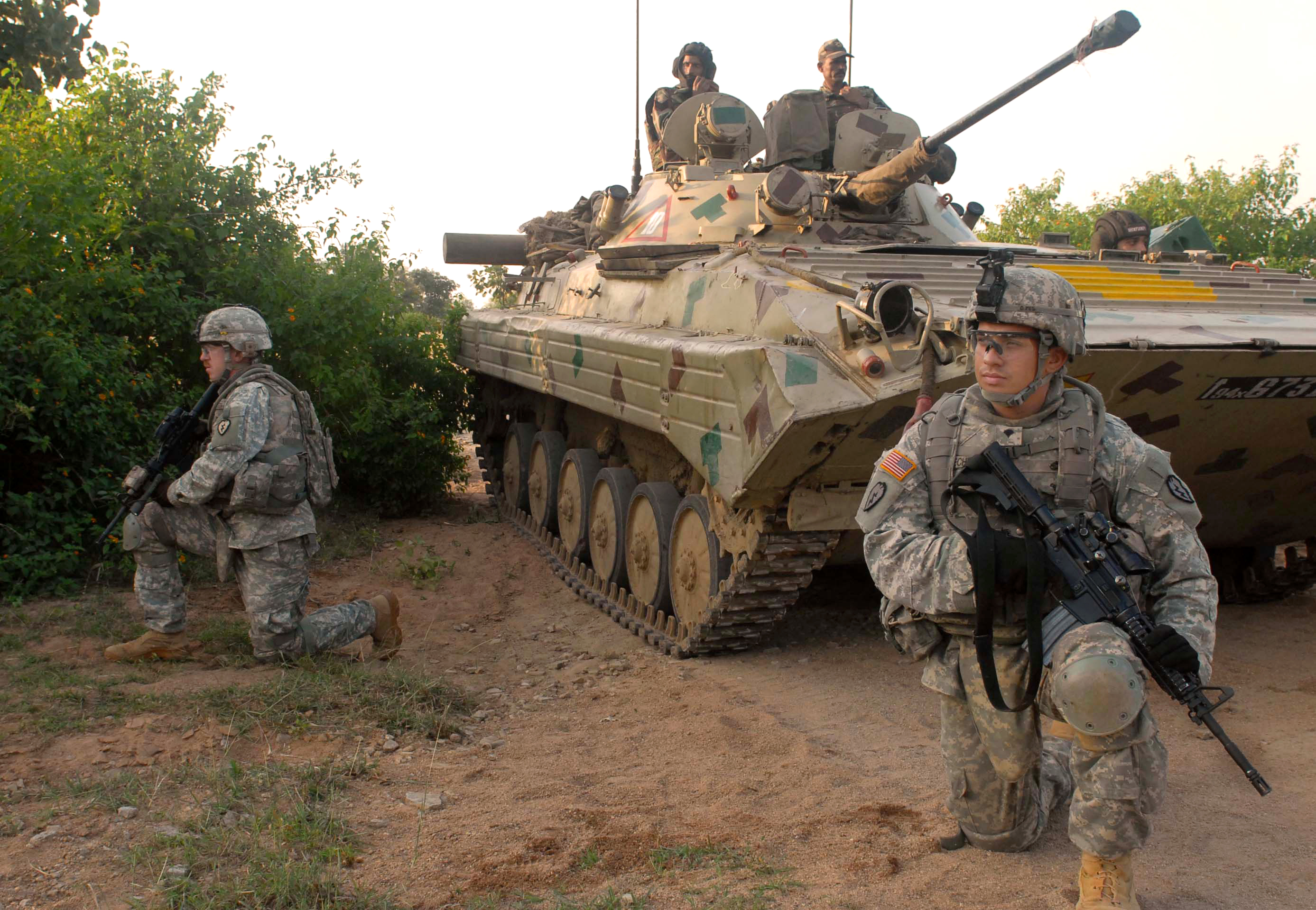 U.S. Army Staff Sgt. Kris Jorgensen, left, and Spc. Jason Echevarria ...