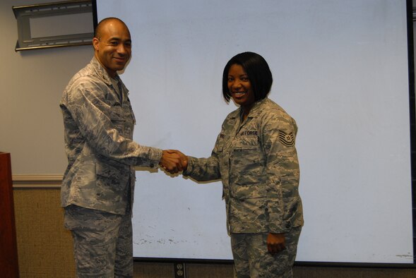 Coining Pope's Finest:Each week Col. James Johnson, 43rd Airlift Wing ...