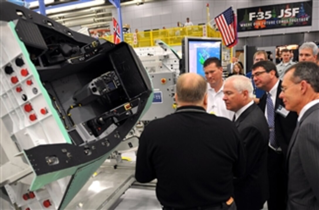 Secretary of Defense Robert M. Gates is briefed by Mike Bateman.