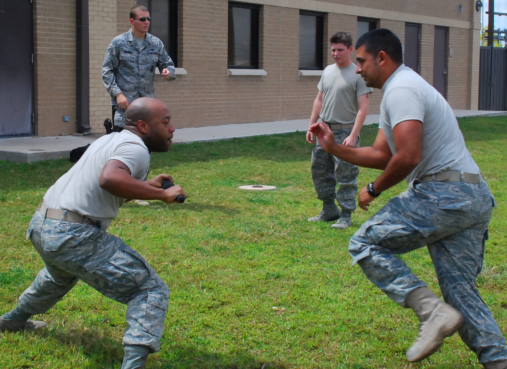 Security Forces augmentees train with baton