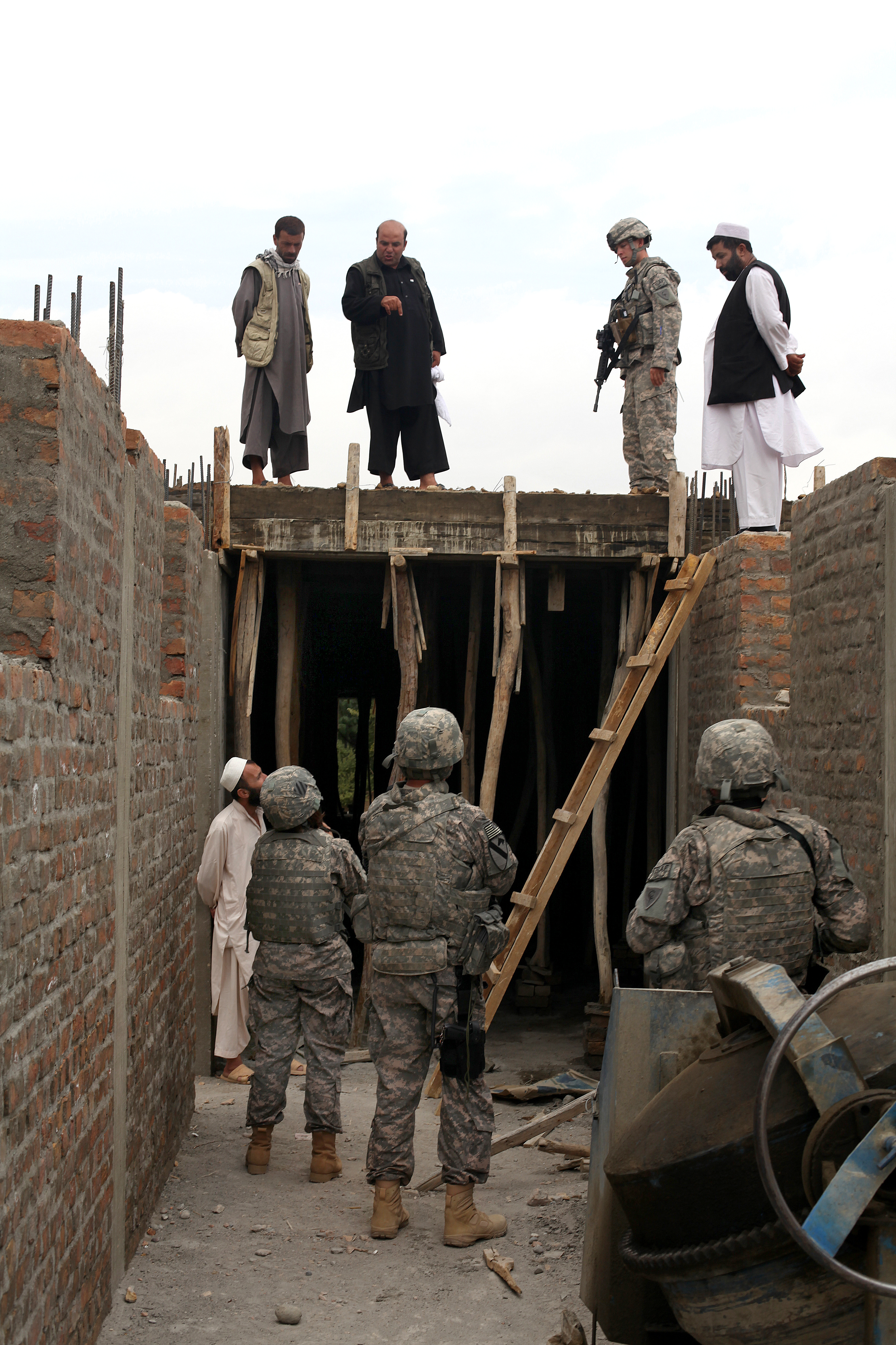 U.S. Air Force 1st Lt. Anthony Raffaele and other members of the Kapisa ...