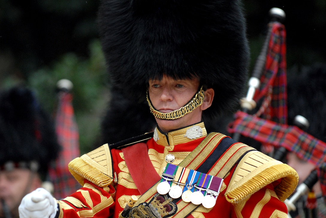 Scots Guard Drum Maj. Martin Godsman commands the soldiers of the Pipes ...