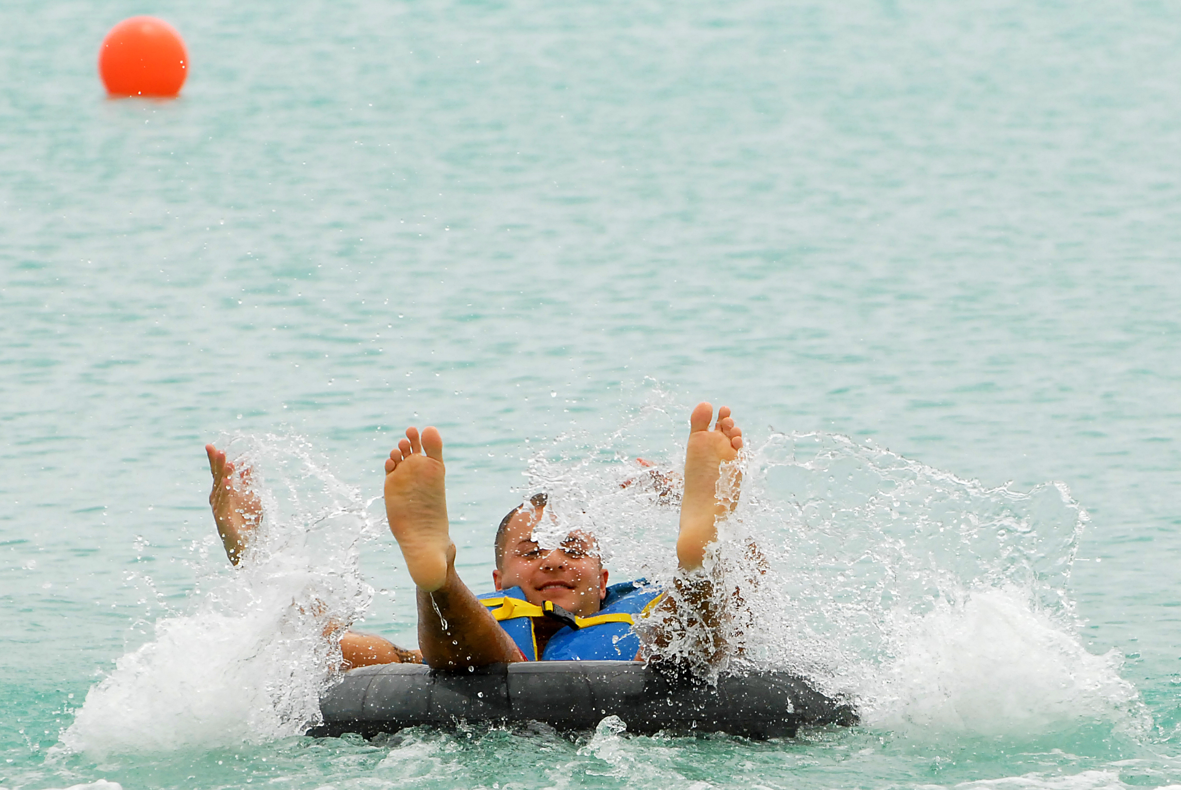 Team Hickam Sports Day: Inner tube relay race > 15th Wing > Article Display