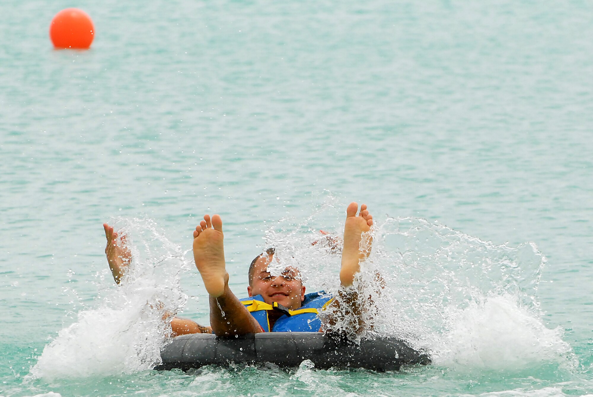 Team Hickam Sports Day: Inner tube relay race > 15th Wing > Article Display