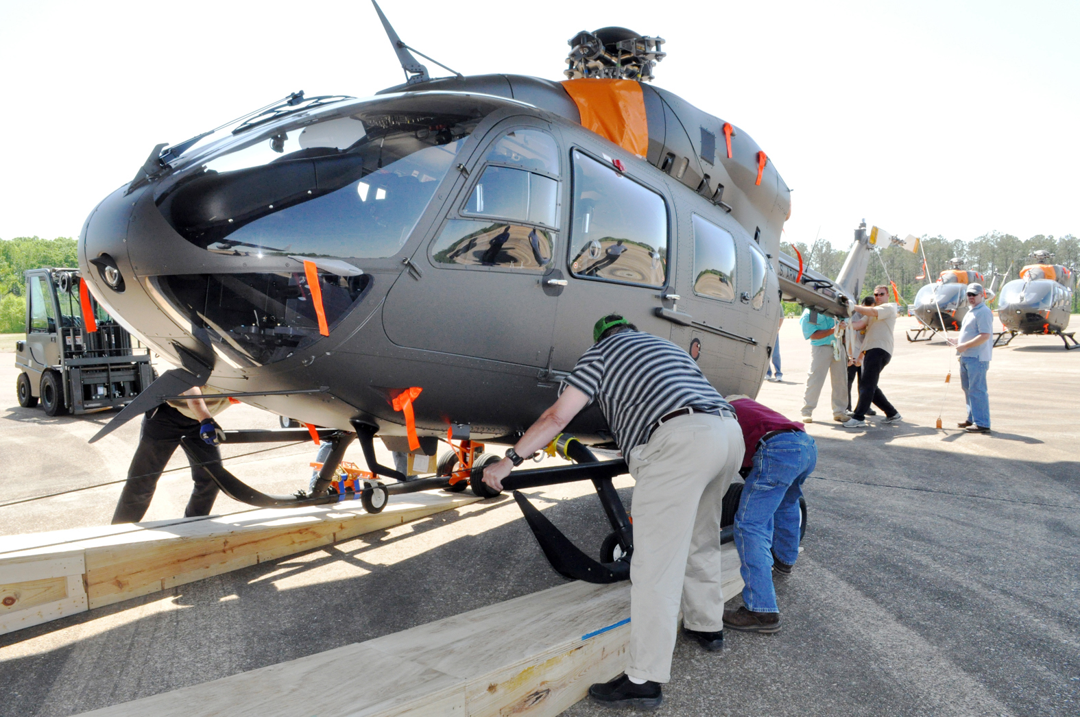 Airmen deliver new Army helicopter to war zone